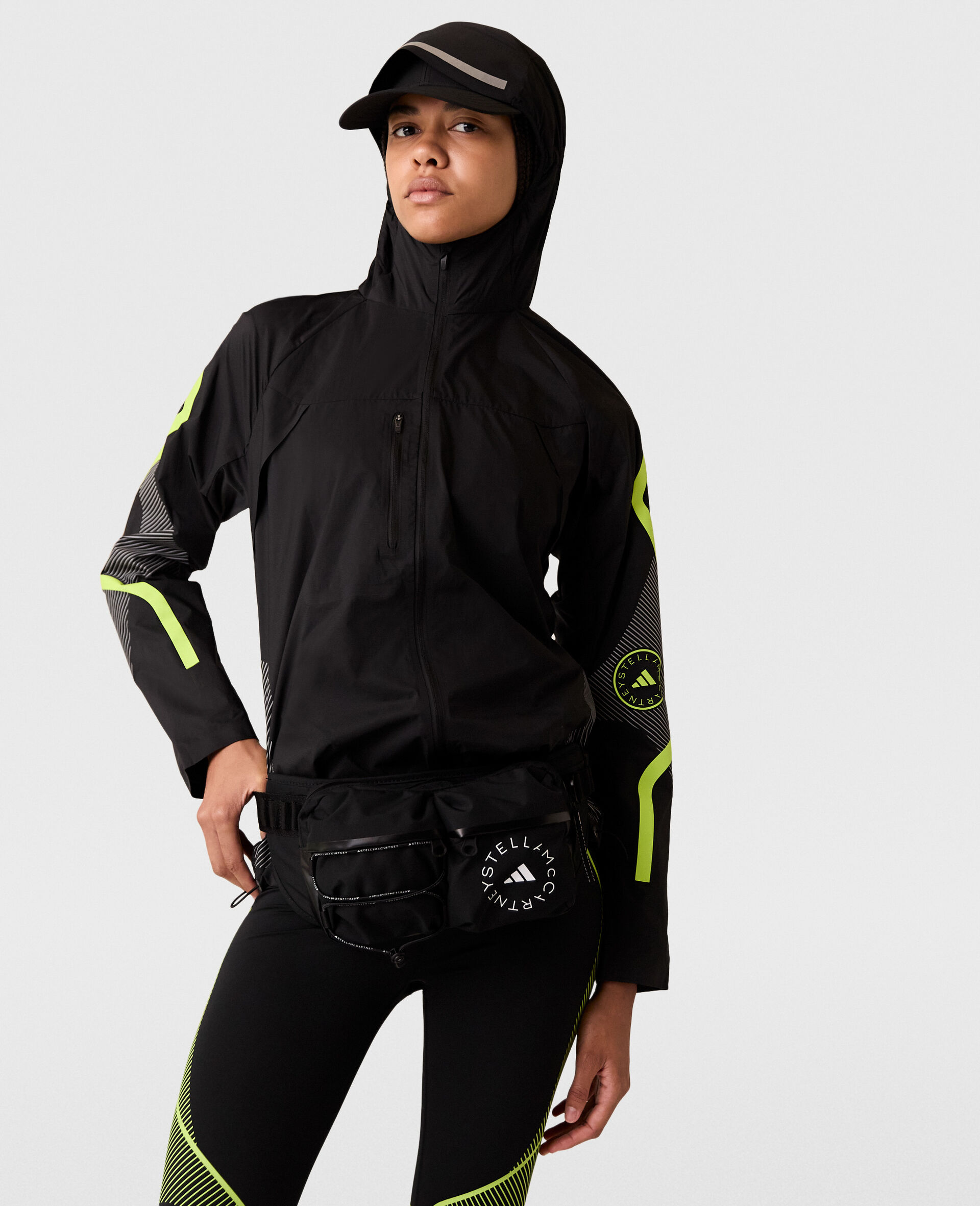 Women Black/Semi-Solar Slime TruePace Hooded Running Jacket | Stella ...